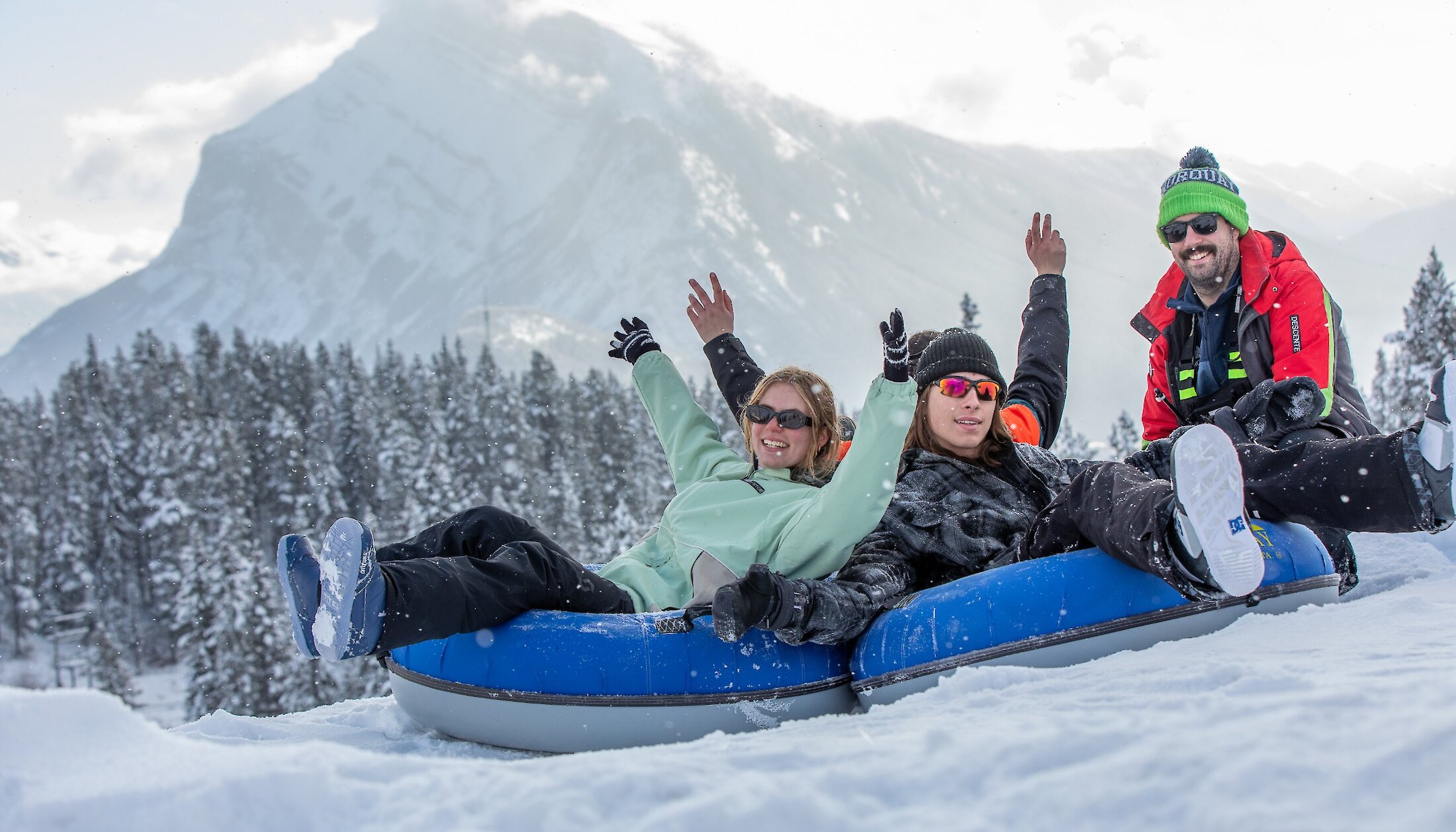 Family Excitement In The Snow! Tubing is the Ultimate Way to Play ...